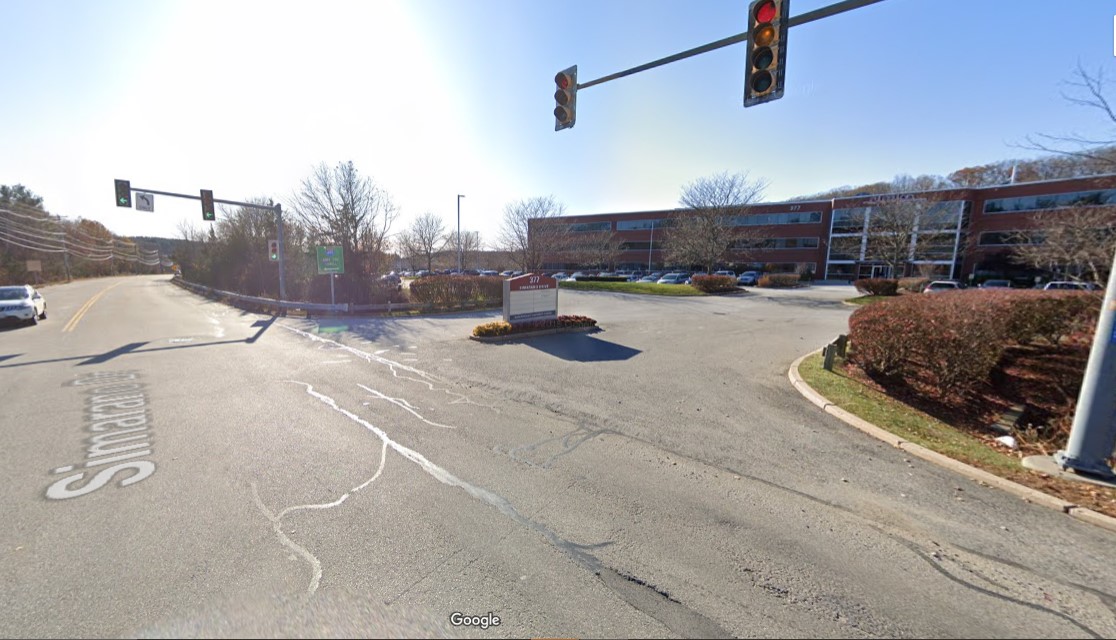 Erratic Driver Smashes into Marlborough Office Building, Two Men