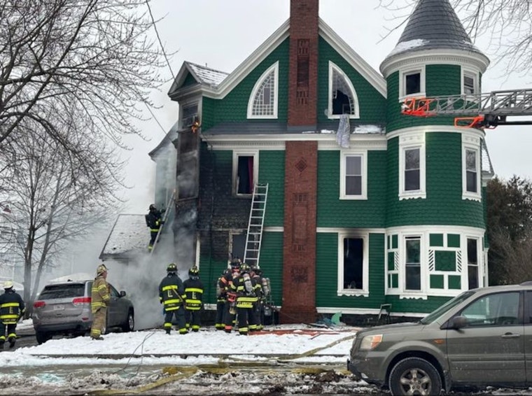 Heroic Firefighters Conduct Ladder Rescue Amid Lawrence Home Blaze,