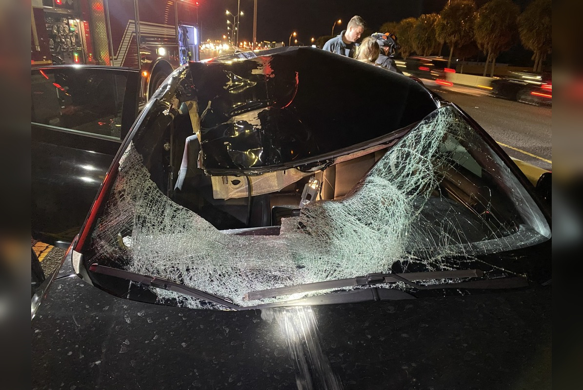 Mother and Daughter Miraculously Unhurt as Runaway Tire Strikes Car in