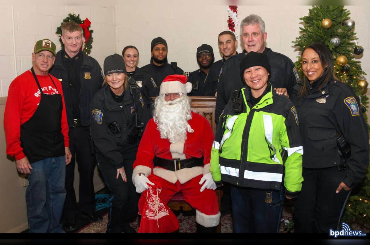 Boston Police Officers Embrace Festive Cheer at Annual St. Monica's