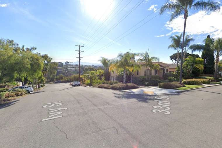 Motorcyclist Hospitalized After Collision with Car at Uncontrolled