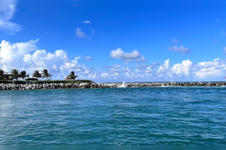 Swimmer Saved in Daring Rescue Amidst Severe Weather in Jupiter,