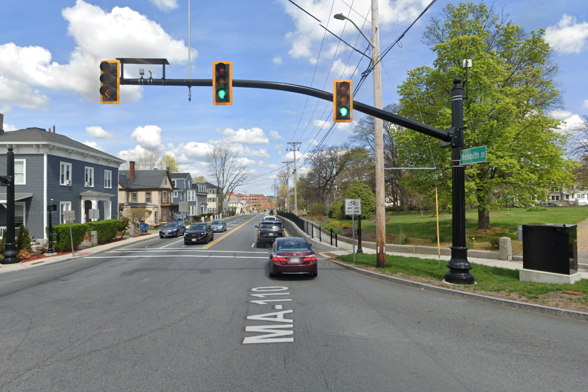 Three Injured as School Bus Tips Over in Lowell Collision, No Children