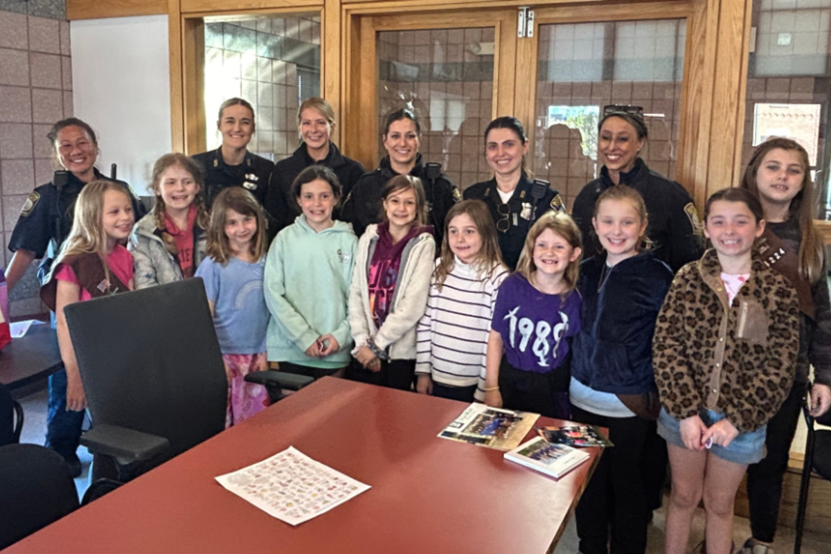 Girl Scouts Partner with South Boston Police to Beautify Neighborhood