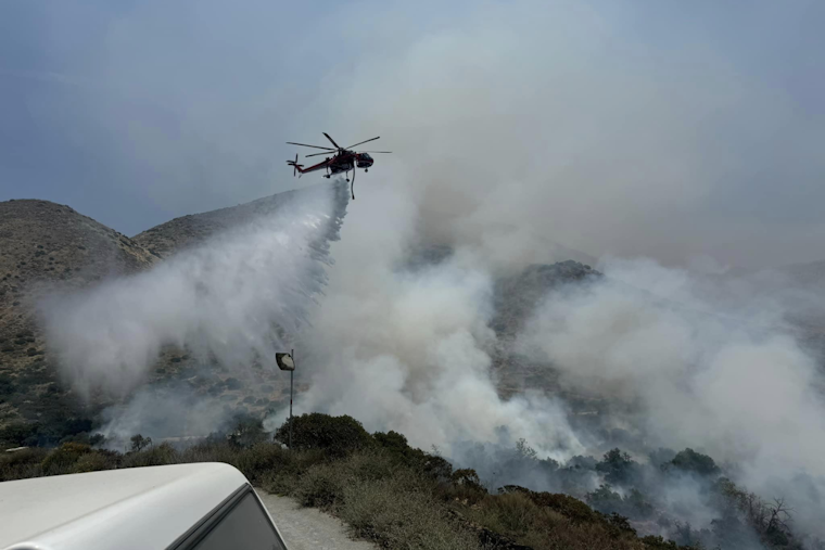 Binational Battle Against Wildfire, Crews Fight to Contain 80-Acre