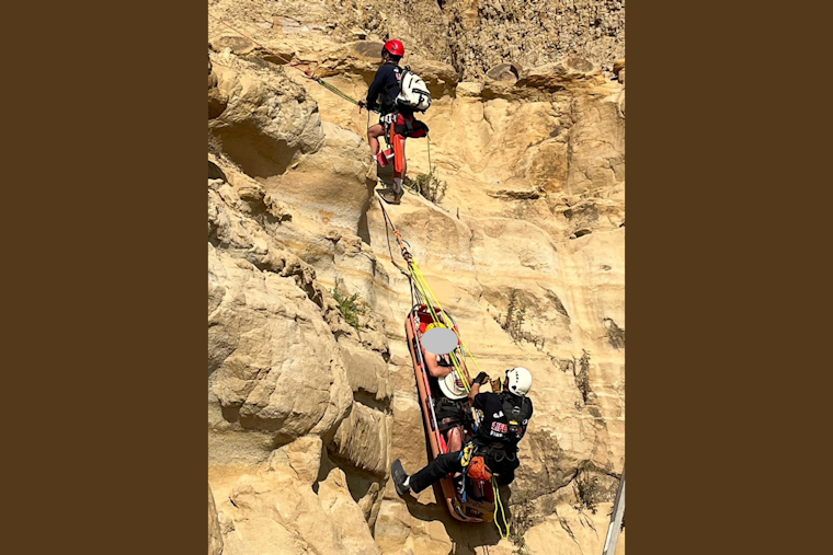 Rescue Team Successfully Retrieves Injured Individual from Cliff at