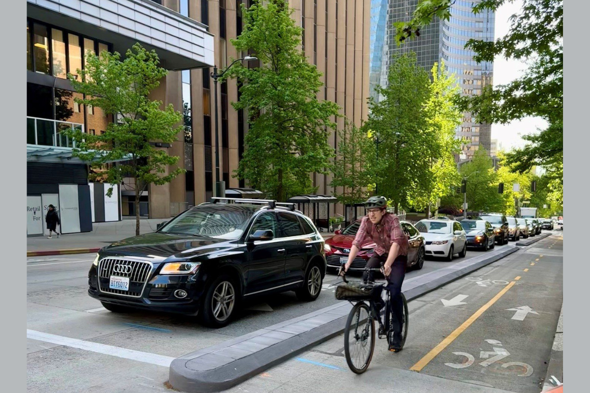 Seattle Unveils Upgraded 4th Ave Protected Bike Lane, Promising Safer