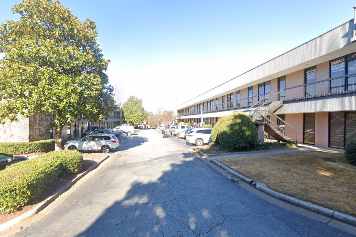 Security Guard Killed, Another Person Injured in Shooting Outside