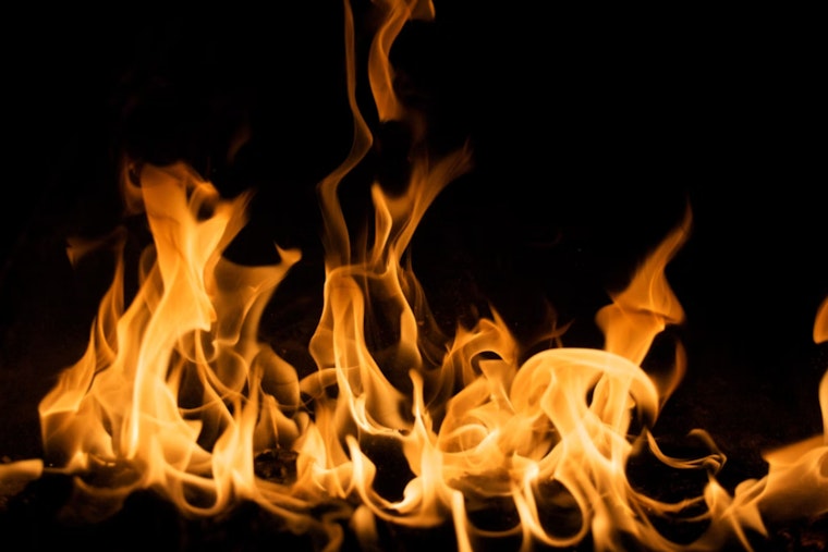 Milton Home Engulfed in Flames Displaces Nine Residents as Community