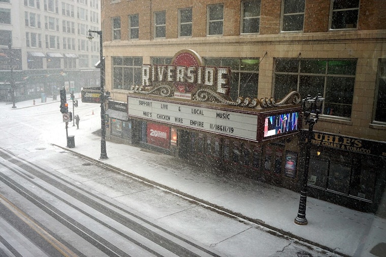Winter's Chill Descends on Milwaukee Snowfall and Freezing