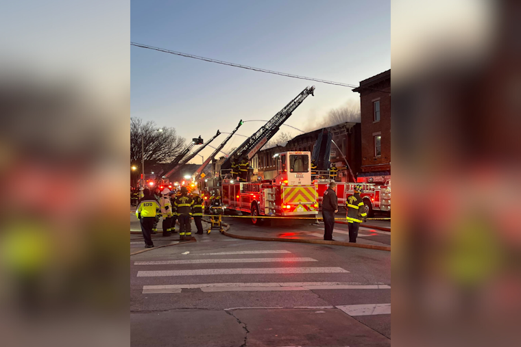 Massive Four-Alarm Fire Ravages Homes and Businesses in West