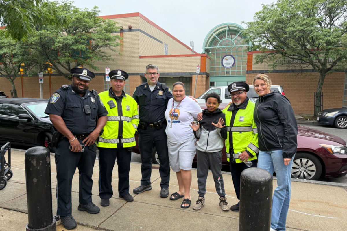 Boston Police Bond with Archdale Village Residents at 'Hot Dog Night'