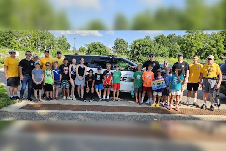 Eden Prairie Officers Bond with Youth in "Let's Go Fishing!" Community