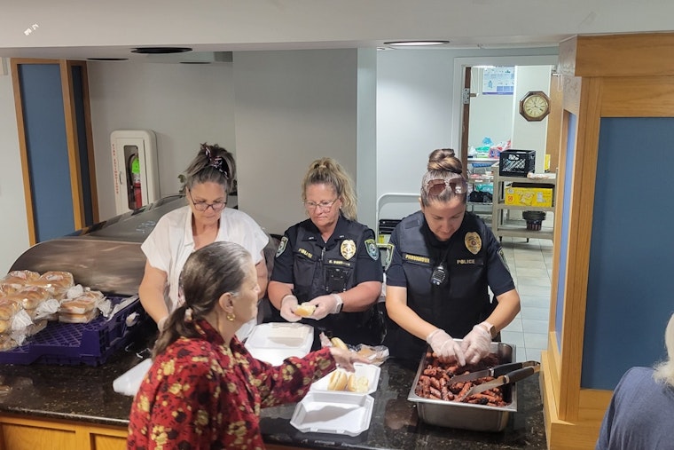 Midwest City Police Serve Up Smiles and Hot Dogs at Senior Housing 4th
