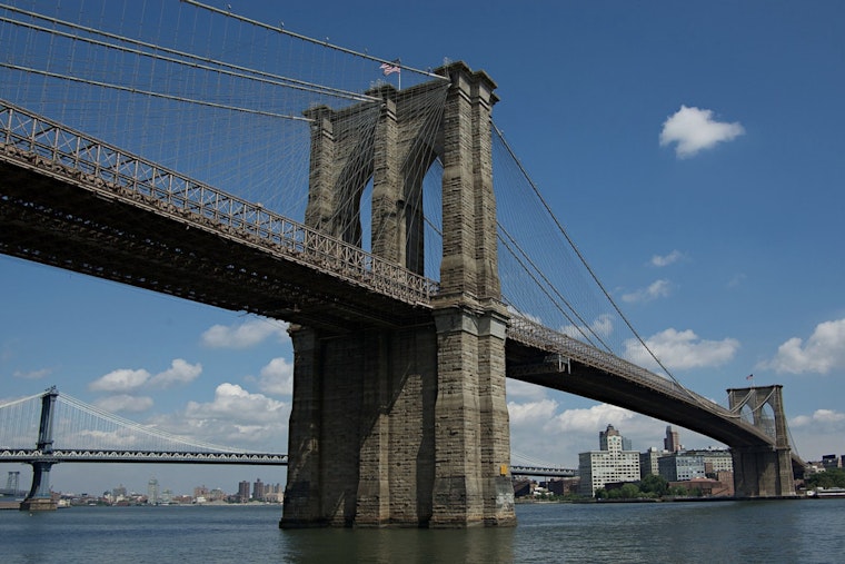 Thousands March Across Brooklyn Bridge Demanding Financial Equity for