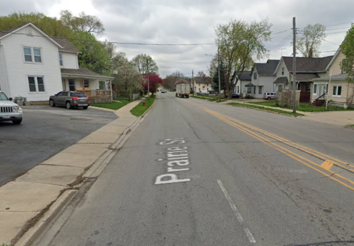 Aurora House Fire: Dramatic Rescue as Resident Leaps into Officer's