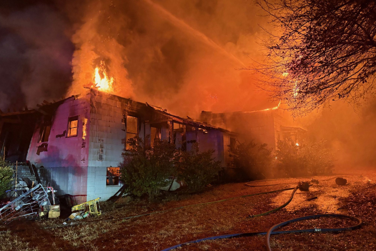 Brave Firefighters Rescue Individual from Blazing Athens Home on