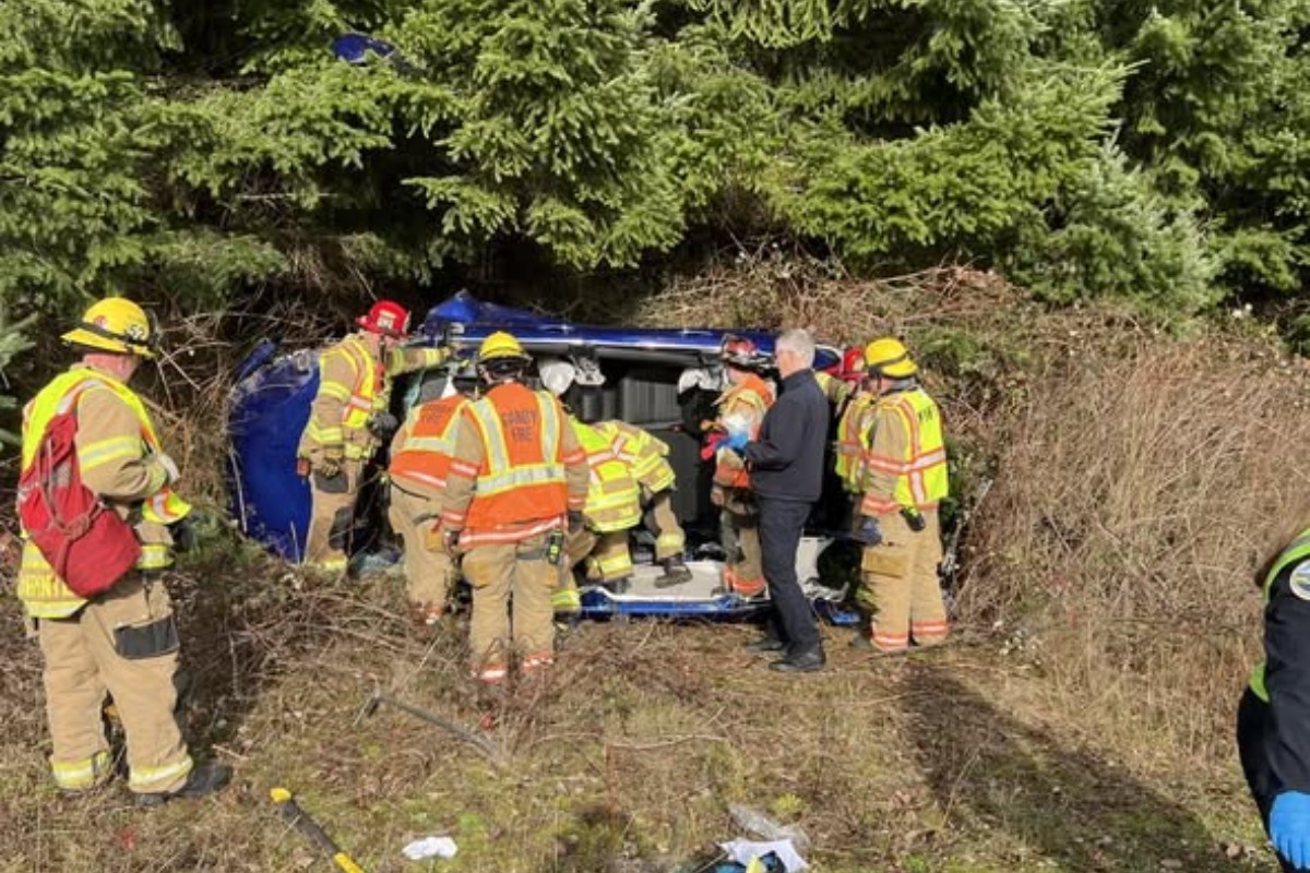 Driver Rescued from Overturned Vehicle Entangled in Power Lines by