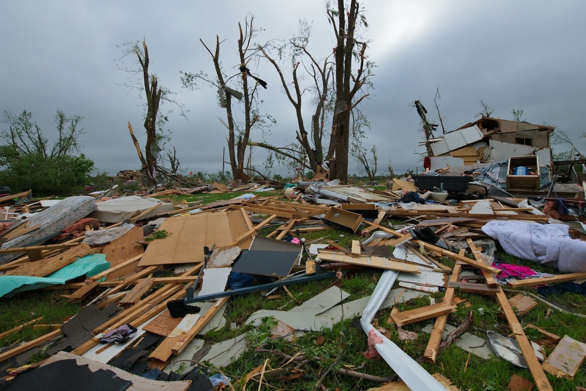 Volleyball Team Helps Clean Up Morgan Township Farm After Tornado