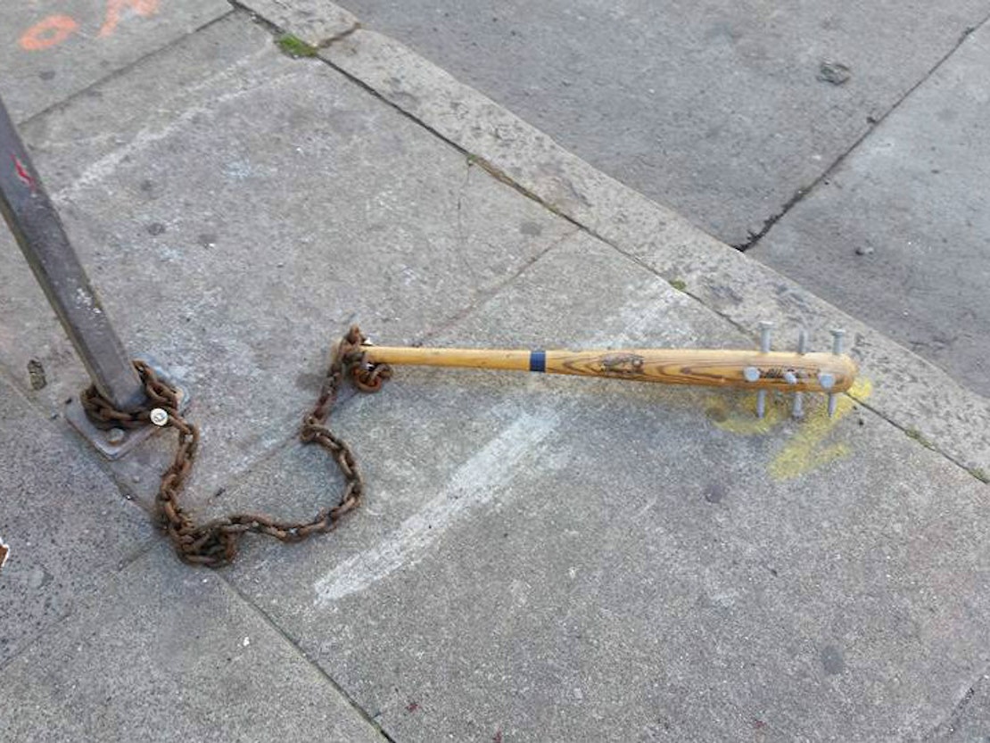 Dozens Of Spiked Baseball Bats Found Chained Around The City