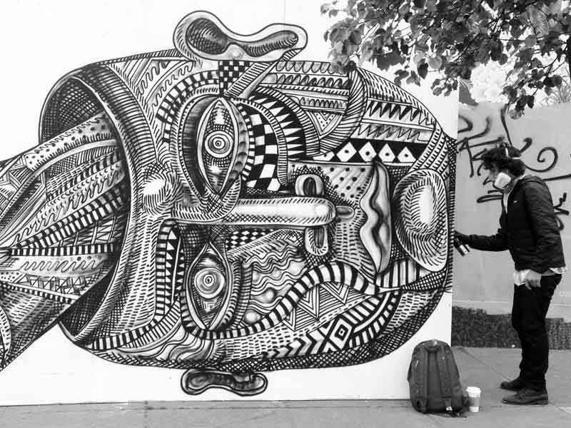 Zio Ziegler Mural Takes Shape at Grove and Divis